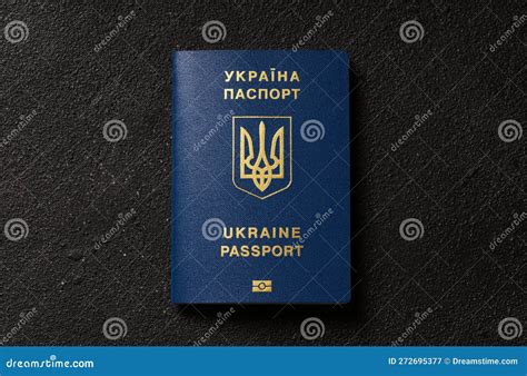 New Ukrainian Blue International Biometric Passport Lying On Old