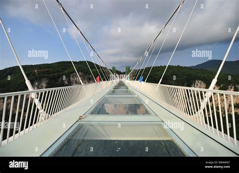 View Of The Worlds Longest And Highest Glass Bottomed Bridge Over The Zhangjiajie Grand Canyon