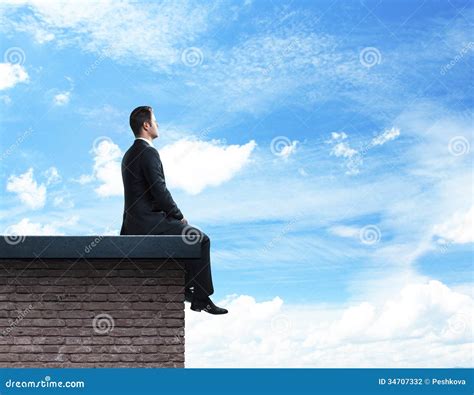 Businessman Sitting On Roof Stock Photo Image Of Cumulus Global