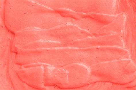 얼굴 및 바디 토닝 스크럽 정화의 화장품 텍스처 한방 피부 화장품 크림 이나 젤 커널 입자 닫습니다 생활에서 유행 배경 2019 년의 산호 색깔 0명에 대한 스톡 사진 및