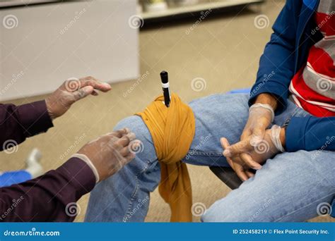 First Aid Training To Treat A Stab Wound By Fixing The Object Stock Image Image Of Hurt Help