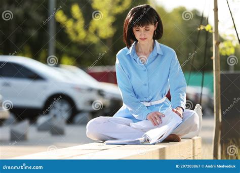 Concentrated Businesswoman Entrepreneur Reading Papers And