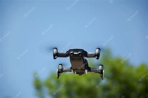 Premium Photo Flying Drone Under The Sky