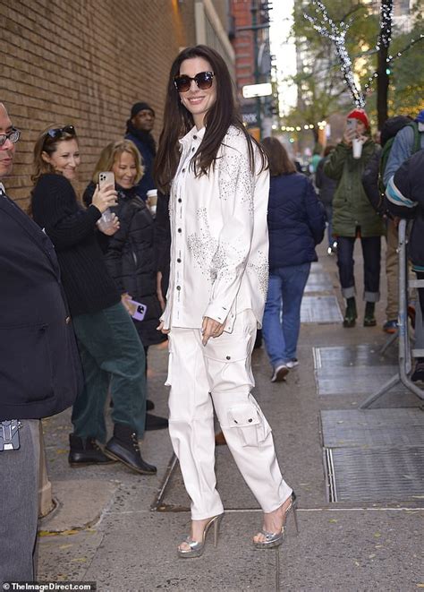 Anne Hathaway Teases A Glimpse Of Her Midriff In Rhinestone Studded