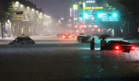 Photos Eight Dead After Heavy Rains Cause Major Floods In Seoul