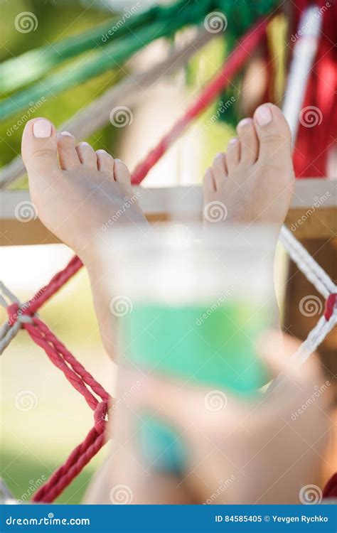 Woman Holding Cocktail In The Hammock Stock Image Image Of Green