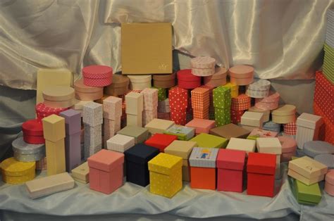 There Are Many Different Boxes On The Table And One Is Made Out Of