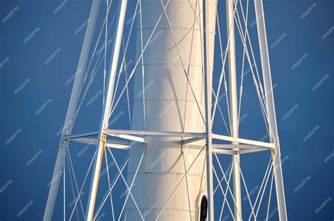 Premium Photo Metal Frame Structure Of High Industrial Tower Enforced With Steel Bars