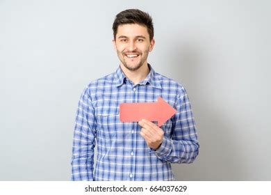 Man Red Arrow Pointing Right Isolated Stock Photo Shutterstock