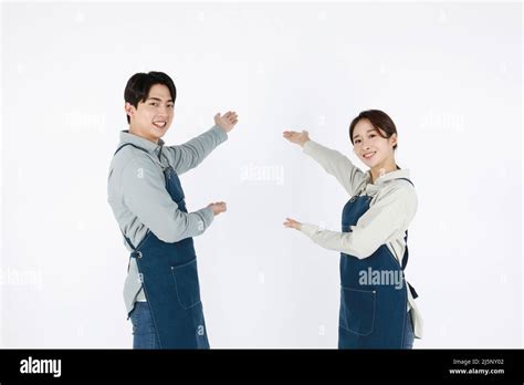 Start Up Concept Asian Korean Young Woman And Man With Hand Motions