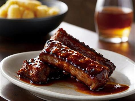 Barbecue Ribs Glazed In Sticky Sauce With Tender Meat Falling Off The