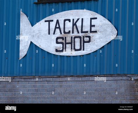 Tackle Shop Sign In The Shape Of A Fish Stock Photo Alamy
