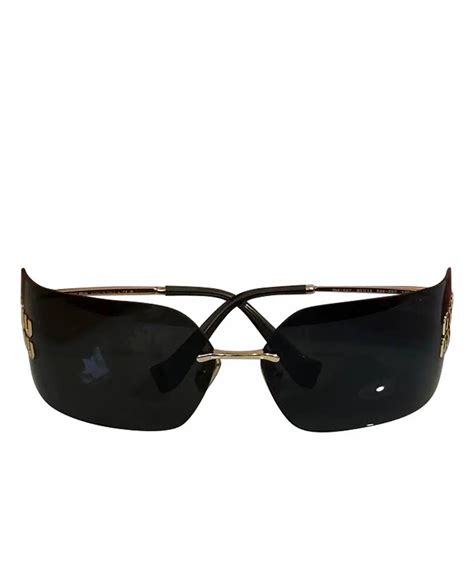 Miu Miu Черные солнцезащитные очки для женщин купить в интернет магазине с доставкой