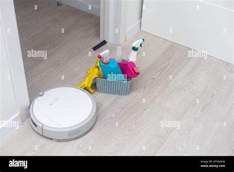 Picture Of An Automatic Intelligent Robotic Vacuum Cleaner And Colorful