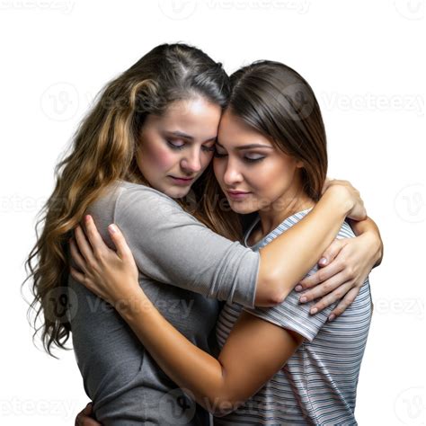 Emotional Embrace Between Two Women Showing Comfort And Support