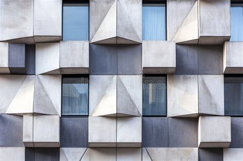 Modern Office Building Facade With Repeating Geometric Patterns Stock
