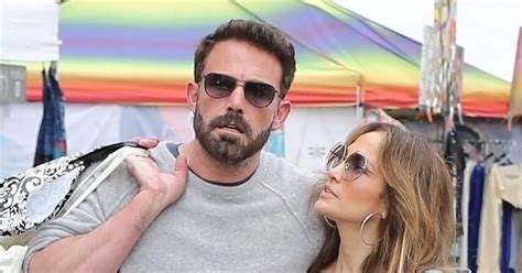 Jennifer Lopez Flirtatiously Grabs Ben Affleck As The Pair Get Cosy On