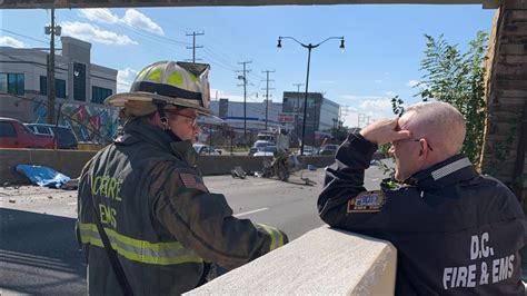 Firefighters Evaluating Pedestrian Bridge On Dc 295 After It Was Hit By