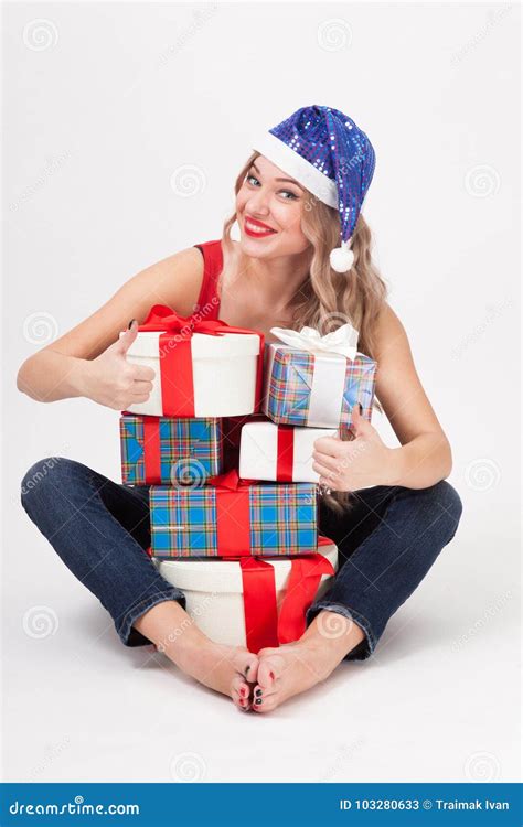 A Blonde With Big Breasts Sitting On White Background Among Stock Image