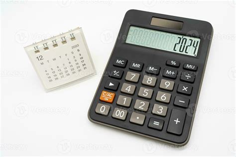 Calculator With The Number On The Display And Calendar DEC Concept Of Finance Taxes