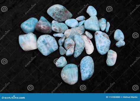 Larimar - Tumbled Pieces on Black Background Stock Photo - Image of rocks, mineral: 112284880