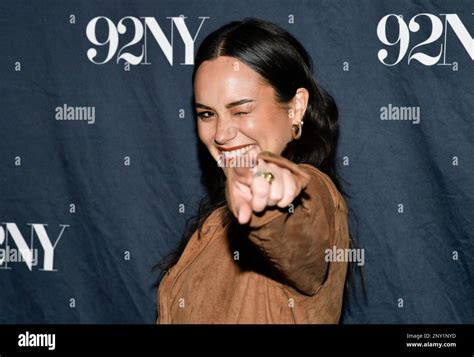 Emily Curl Poses Backstage Before Discussing The Netflix Television Series Outerbanks At The