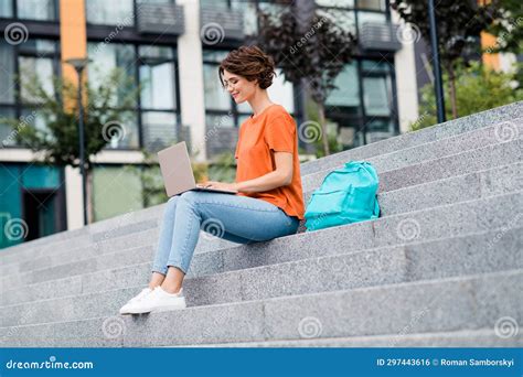 Photo Of Sweet Positive Lady Wear Orange T Shirt Spectacles Sitting