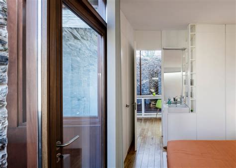 Stone Wine Cellar Converted Into Home By Cubus Arquitectura