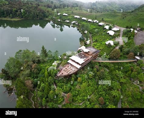 Aerial View Of Scenic Nature Lakeside Resort With Greenery Reflection
