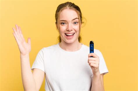 Premium Photo Receiving A Pleasant Surprise Excited And Raising Hands