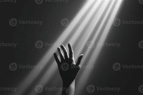 Stylized Poster Art Featuring A Hand Reaching Towards Light Beams