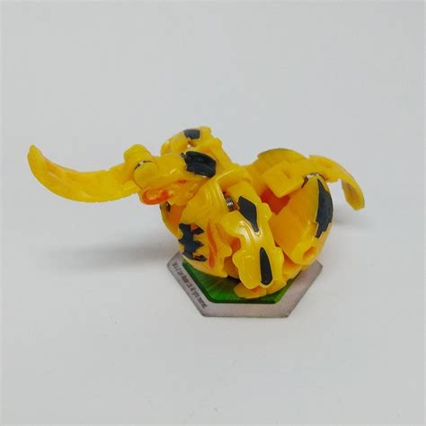 Baa Maxodon Bakugan Battle Planet Gold Maxodon สามเหลี่ยมสกรูรหัสสะสม