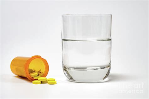 Medication And Glass Of Water Photograph By Wladimir Bulgarscience