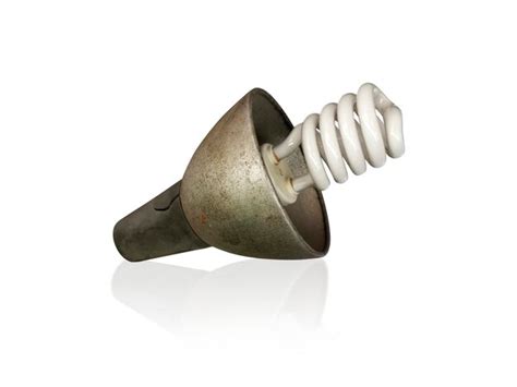 Premium Photo Old Technology And Wasting Electricity Burned Out Light Bulb