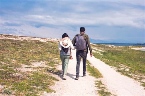 Premium Photo A Nice Couple Walking In The Forest