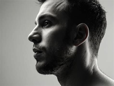A Man With A Beard And A White Background Premium Ai Generated Image