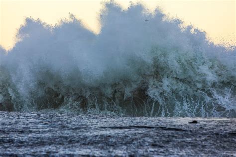 Powerful Display Of Ocean Waves Colliding Creating Water Explosion In