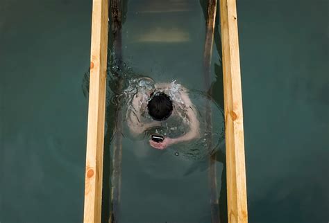 Epiphany Russian Orthodox Christians Plunge Into Frozen Rivers And