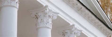 Banner Close Up Of White Columns Of A Building With A Classical Design