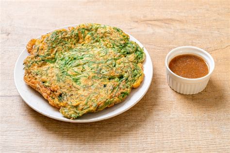 Premium Photo Fried Egg With Climbing Wattle And Spicy Shrimp Paste