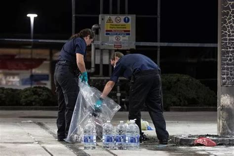 Forensic Crime Scene Cops Pictured Examining Petrol Station After Man