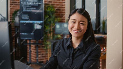 Free Photo Smiling Software Developer Typing Machine Learning App