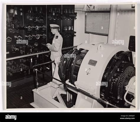 U S Maritime Engineer Cadet In Engine Room Of Large Liner Checking