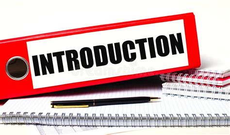 On The Desktop Are Notebooks A Pen And A Red Folder For Papers With