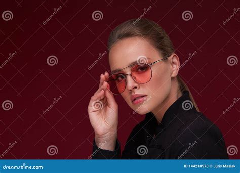 Portrait Of Beautiful Young Woman With Perfect Makeup Wearing Pink