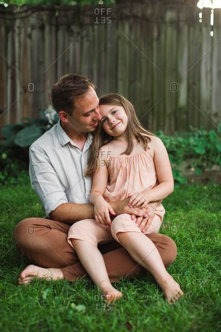 Daughter Sitting On Fathers Lap Telegraph