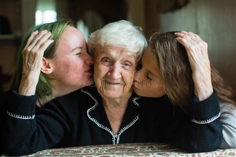 Grandmother Kissing Granddaughter Picture Image 6049821