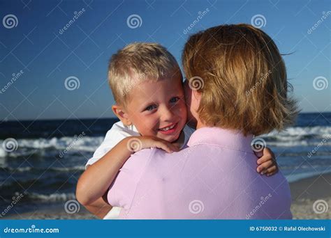 Mother Hugging Son On A Beach Stock Photo Image Of Affection Outdoors