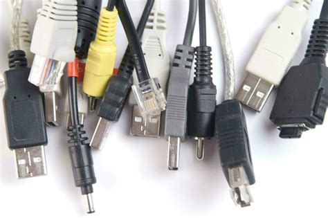 A Hand Holding Several Different Types Of Cables 27094472 Stock Photo At Vecteezy