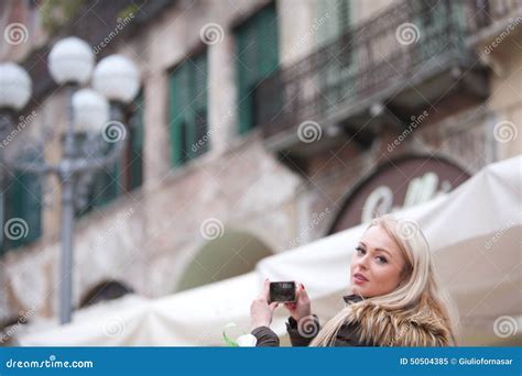 Blonde Tourist Taking Photographs In The City Stock Image Image Of